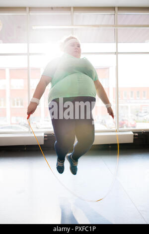 Fat Woman Jumping Stock Photo - Alamy