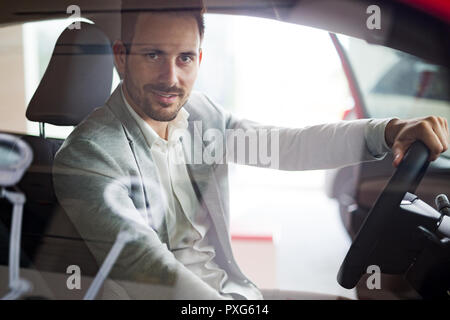 Young business man test drive new car Stock Photo - Alamy