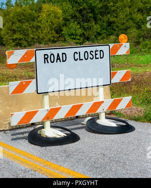 An end of road reflector barrier sign and street sign for Timber Tops ...