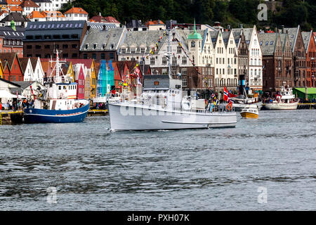 Veteran submarine chaser Hitra (built 1942) passing in front of navy ...