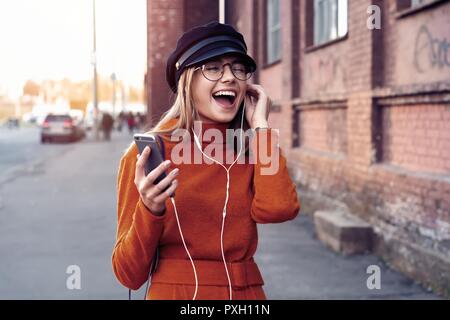 Lovable female girl in weekend morning. bouquet of tulips Stock Photo ...
