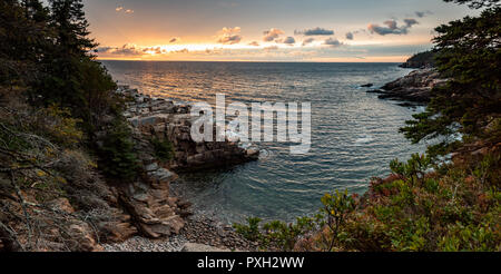 Acadia National Park, Maine: Colorful rocks piled against cliff face at ...