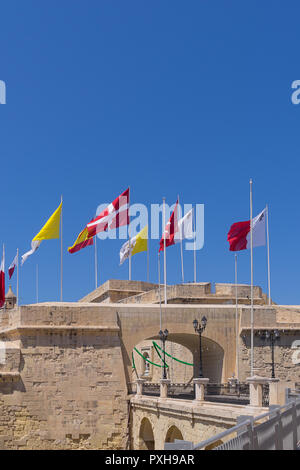 The maltese and the european flags waving in front of the sea Stock ...