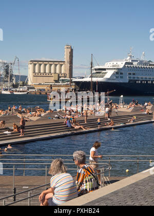 Sørenga a new and popular inner city beach in Oslo Norway on a hot ...