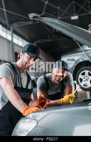 Professional mechanics workshop where automotive mechanics engineers ...