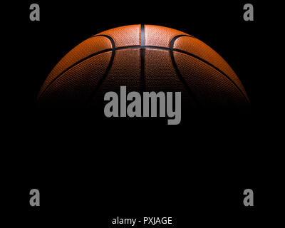 Basketball close-up on black background with bokeh, spotlights and fire ...