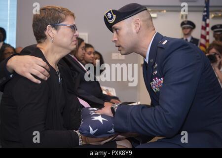 U.S. Army Lt. Col. Miguel Cisneros, right, welcomes U.S. Soldiers ...