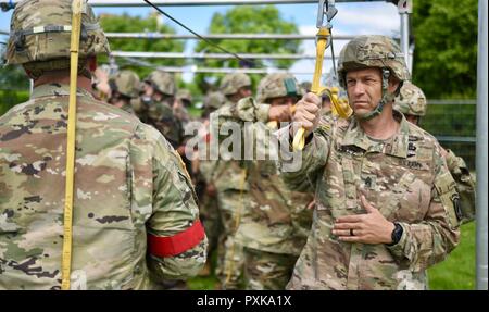 CSM Franklin Velez of the 173rd Airborne Brigade conducts pre-jump ...