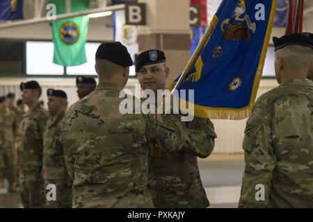 Col. Jeffrey A. Becker, commander, 3rd Combat Aviation Brigade hands ...