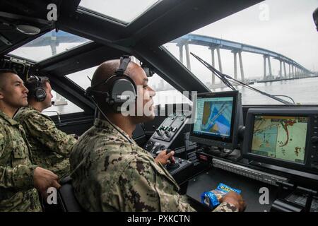 U.S. Navy Security forces patrol the San Francisco waterfront in a 34 ...