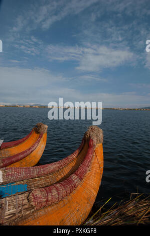 Visiting Uros floating islands Stock Photo - Alamy
