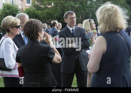Secretary of the Navy the Honorable Sean J. Stackley, left, speaks to ...