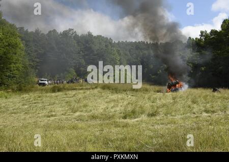 Two dilapidated vehicles are set ablaze to test military emergency ...