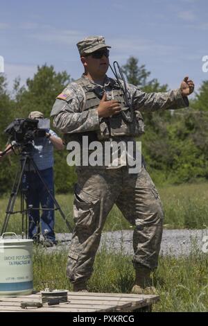 A Soldier with Alpha Company, 572nd Brigade Engineer Battalion, 86th ...