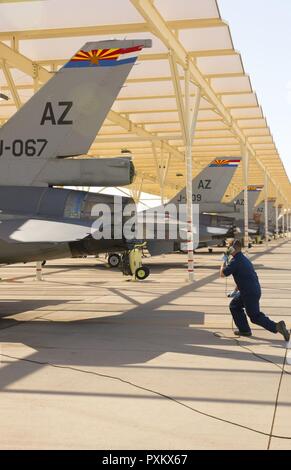 F-16 Fighting Falcons of the Royal Netherlands Air Force taxi past F ...