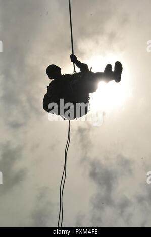 Soldier during assault rappelling exercises with weapons Stock Photo ...