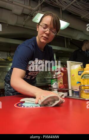 U.S. Marines aboard the USS Wyoming, a notable battleship, are captured ...