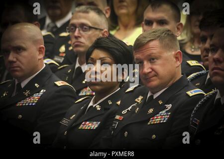 U.S. Gen. Douglas MacArthur, center, Brigadier General Courtney Whitney ...