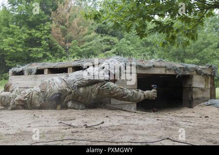 A Soldier with Alpha Company, 572nd Brigade Engineer Battalion, 86th ...