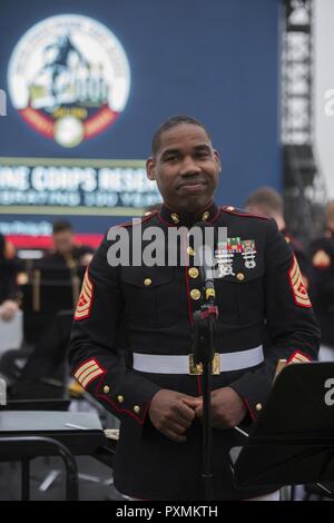 NEW YORK – Gunnery Sgt. Justin A. Hauser, enlisted conductor of Marine ...