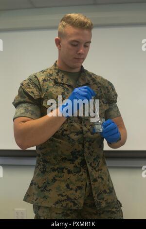 A U.S. Marine with Headquarters Company, Chemical Biological Incident ...