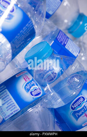 empty plastic water bottle on white background Stock Photo - Alamy