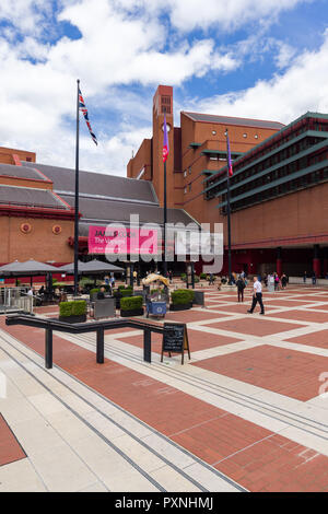 The main entrance of the British Library with people walking to and ...