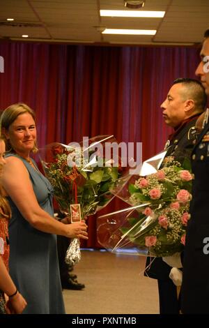 Ms. Cheryl Hustead, Col. Thomas R. Hustead's wife and three children ...
