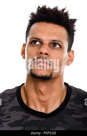 Pensive black African man looking at sky looking for hope Stock Photo ...