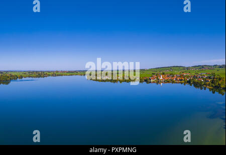 Village of Riegsee on Lake Riegsee, Blaues Land region, Upper Bavaria ...