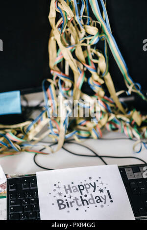 Happy Birthday text on paper card with flower decoration on wooden ...