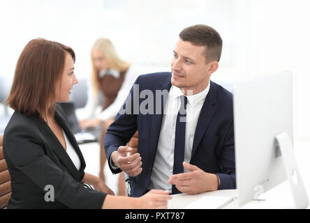 employees discussing business issues in office.office life Stock Photo ...