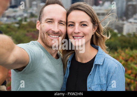 A Happy cute couple enjoy Montreal landscape Stock Photo - Alamy