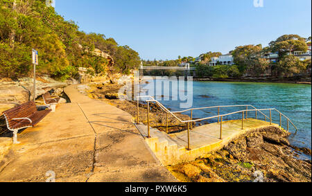 Parsley Bay in Sydney with its cove, pedestrian bridge, beach and ...
