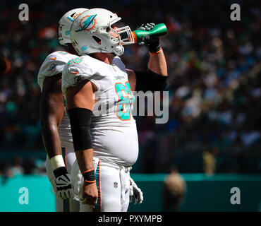 Detroit Lions center Travis Swanson (64) and Detroit Lions offensive ...