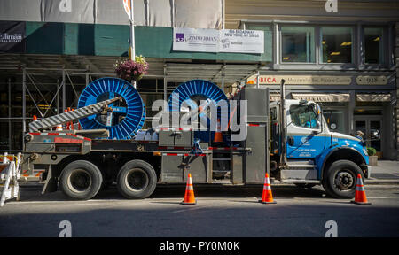a con edison truck parked on the street while doing work. Coned is the ...