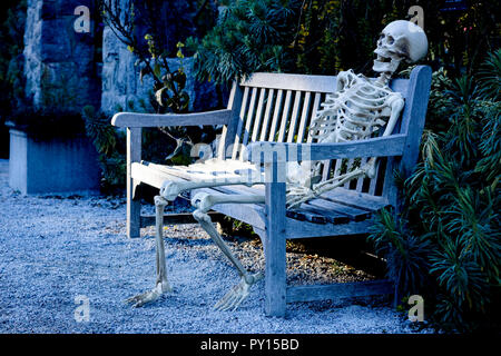 Skeleton on a bench Stock Photo - Alamy