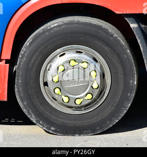 Loose wheel nut indicator tags on HGV Stock Photo - Alamy