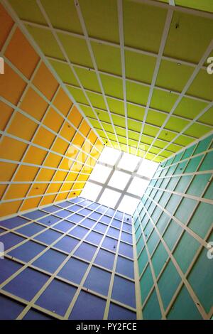Abstract perspective of vertical lobby ceiling with skylight and strong ...
