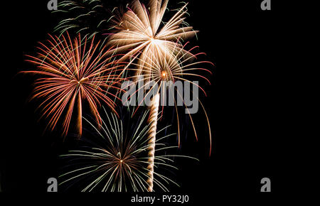 Fireworks of different colors with the black background Stock Photo - Alamy