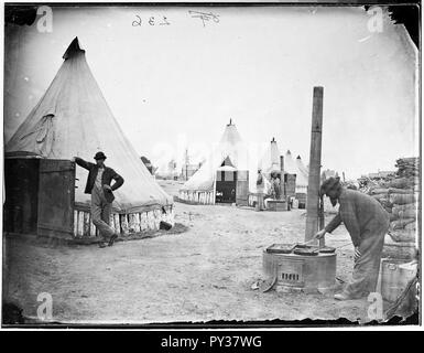 Camp scene. Cooks at work Stock Photo - Alamy