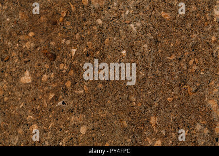 Dark fertile soil texture close up with natural organic ground and ...