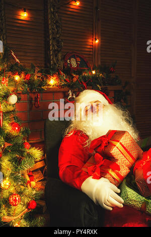 Christmas tree traditional, gifts and lights, white tree Stock Photo ...