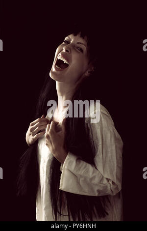 girl ghost vampire crazy scream Stock Photo - Alamy