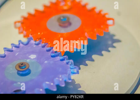 Sample product of plastic cogwheel gears for education. Colorful ...