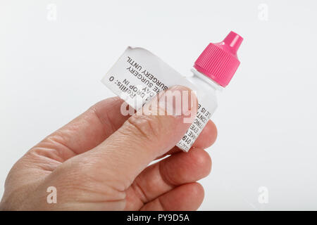 Pink cap eye drop bottle, antibiotic prescription medicine Stock Photo ...