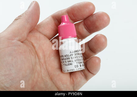 Pink cap eye drop bottle, antibiotic prescription medicine Stock Photo ...