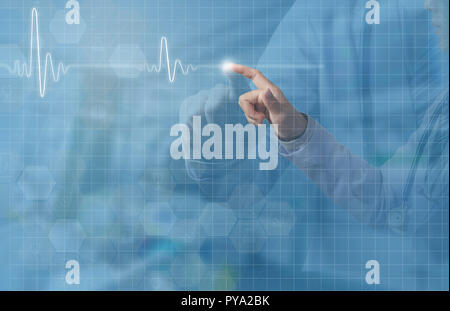 Doctor touching ECG interface Stock Photo - Alamy