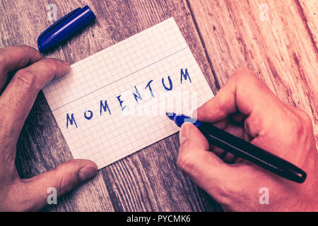 Conceptual hand writing showing Momentum. Business photo showcasing ...