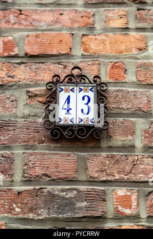 House number 43 sign on gate Stock Photo - Alamy